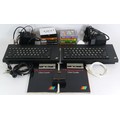 A Sinclair Spectrum ZX +48k machine (working) together with another ...