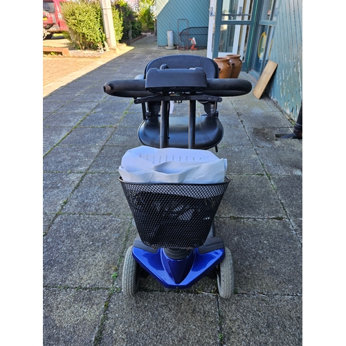 A Strider SD#1 mobility scooter, with instructions and power pack