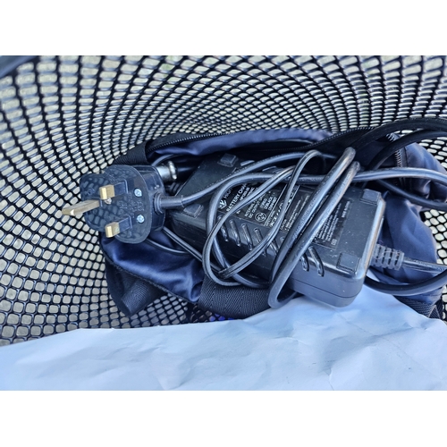 A Strider SD#1 mobility scooter, with instructions and power pack