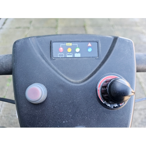 A Strider SD#1 mobility scooter, with instructions and power pack