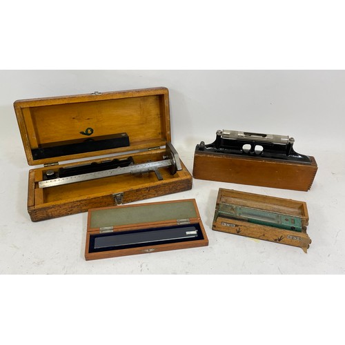 Four early 20th century engineering measures, all boxed.