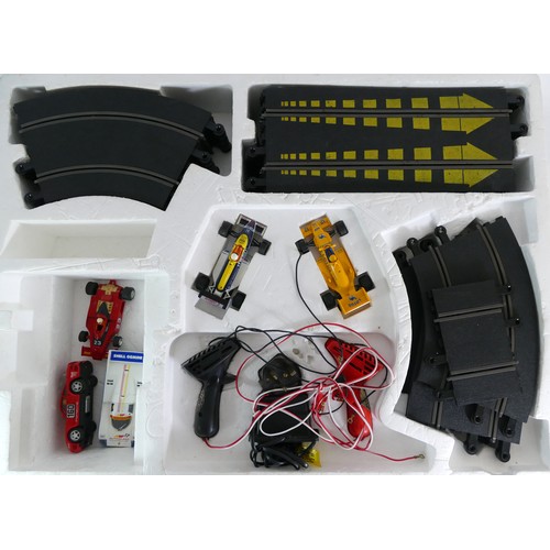 A Scalextric racing car set Formula One, together with a Night Stages ...