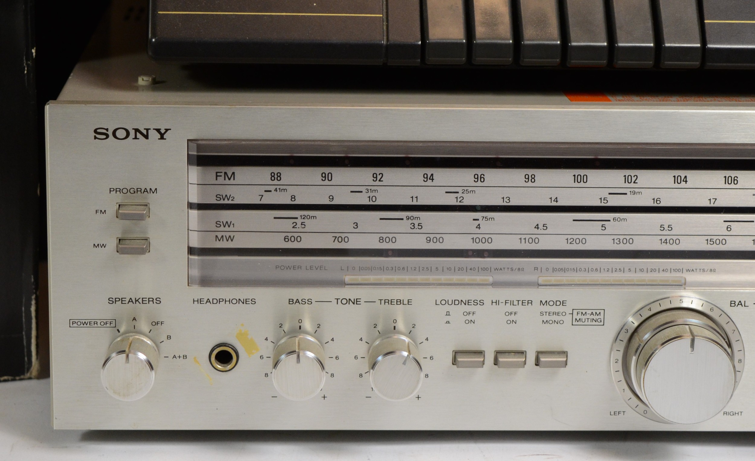 A Sony amplifier receiver model STR-434S, together with a Saisho midi ...