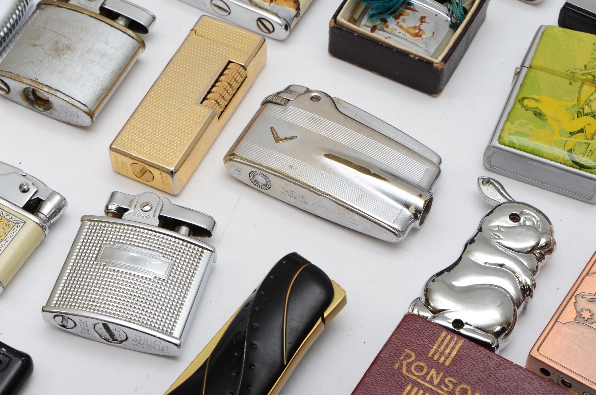 A large collection of pocket cigarette lighters, circa 1950 - 1980s ...