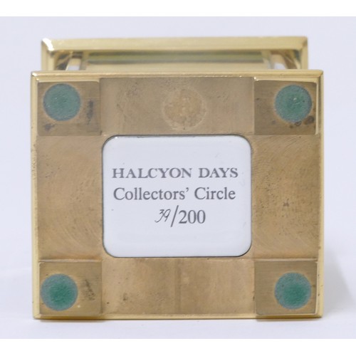 A boxed limited edition Halcyon Days enamel and brass cased limited ...