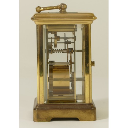 London Clock Co., a brass carriage time piece with white enamel dial ...