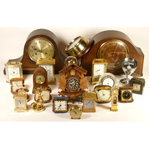 A collection of mid 20th century and later mantel clocks, having manual ...