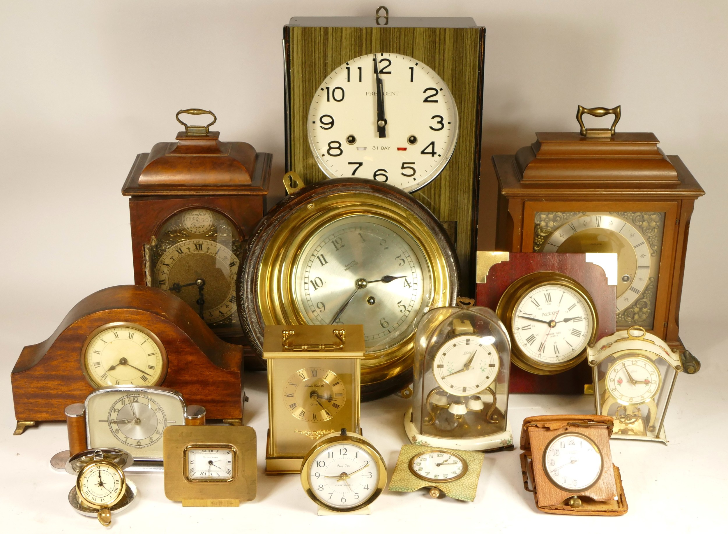 A collection of mid 20th century and later mantel clocks, having manual ...