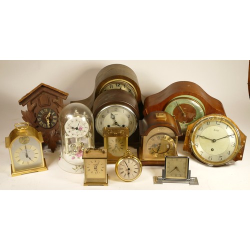 A collection of 20th century quartz clock to include mantle clocks and ...