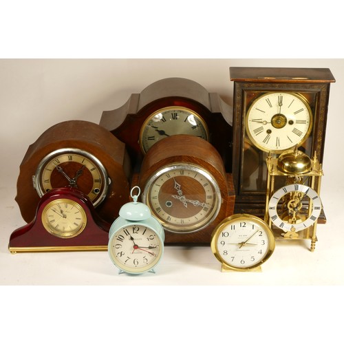 A collection of 20th century quartz clock to include mantle clocks and ...