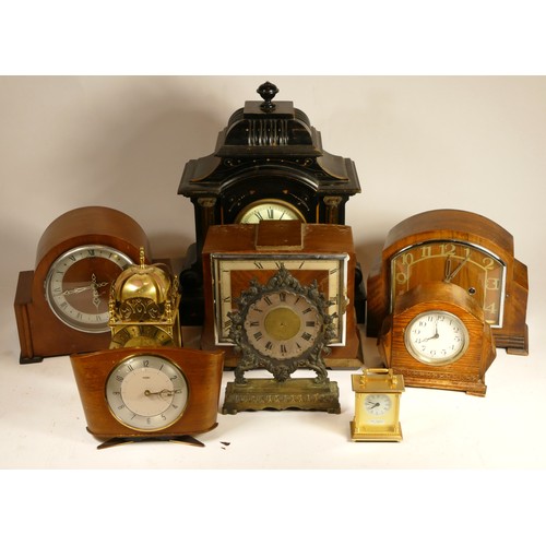 A collection of 20th century quartz clock to include mantle clocks ...