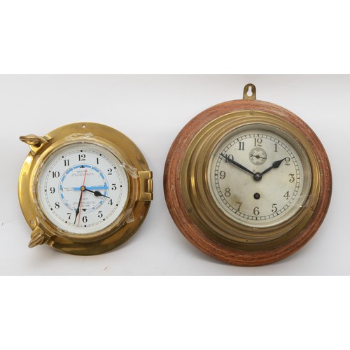 A contemporary brass cased quartz Meridian low/high tide bulkhead clock ...
