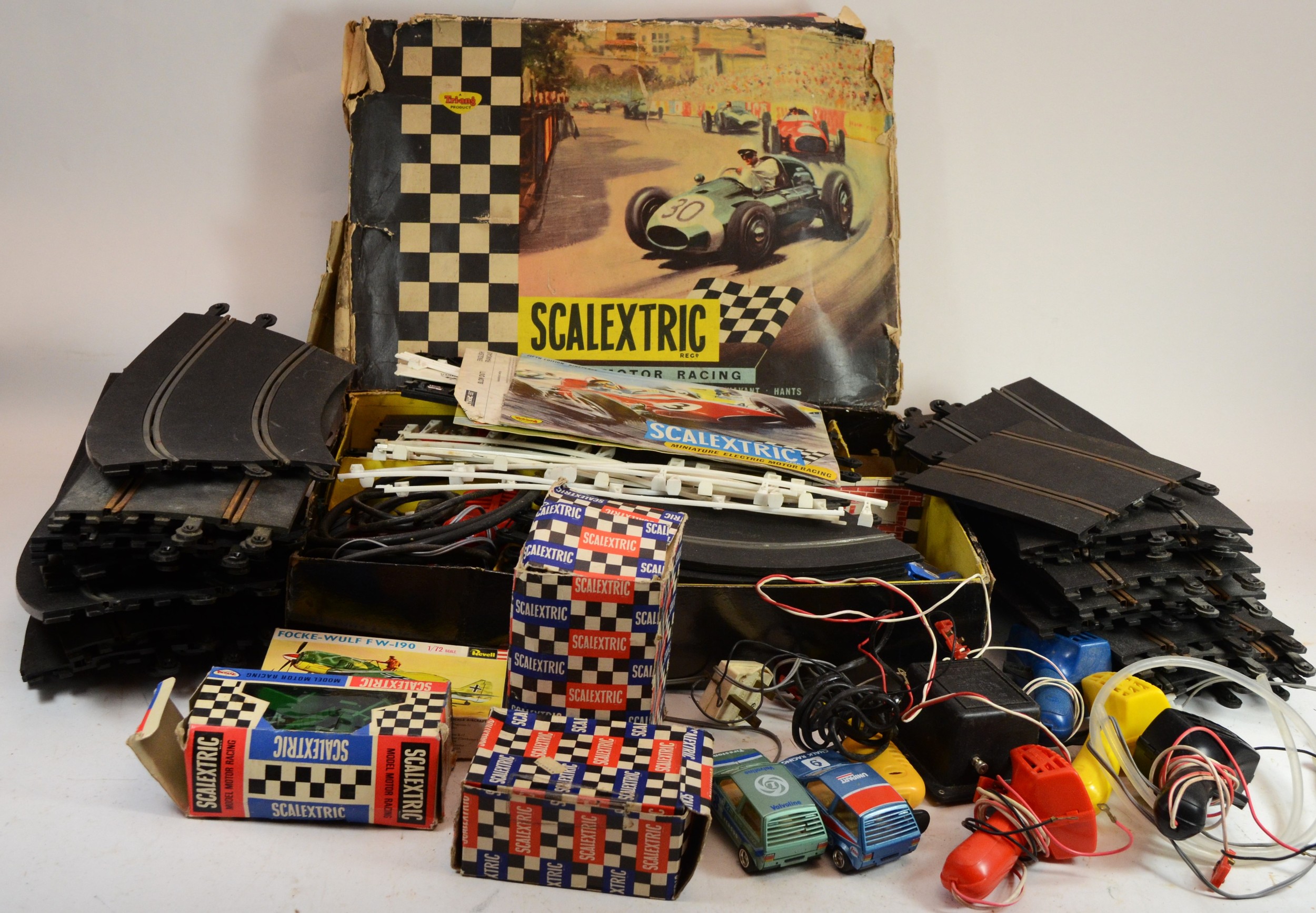 A large collection of Scalextric model motor racing parts and ...