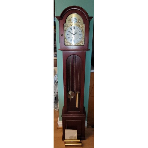 A contemporary German mahogany effect triple weight Grandmother clock ...