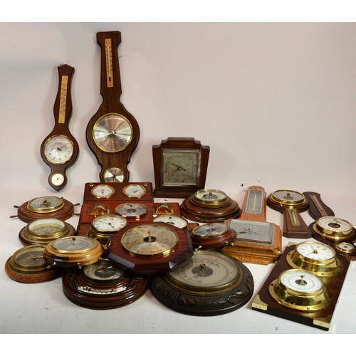 A collection of mid 20th century and later wall hanging barometers. (3)