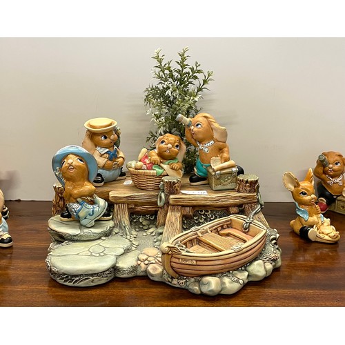 Pendelfin; a collection of twenty four rabbits and two display stands ...