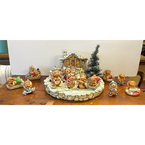 Pendelfin; a collection of twenty four rabbits and two display stands ...