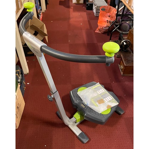 An Exer 'Twist and Shape' fitness machine, complete with instructions ...