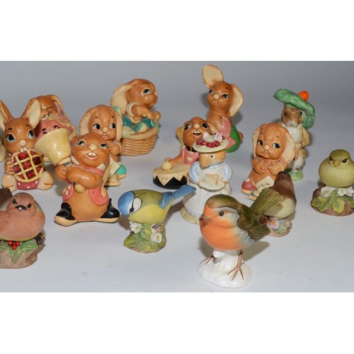 A group of figurines to include Pendelfin rabbits, Royal Albert Beatrix ...