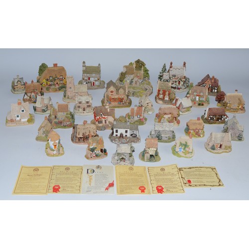 A collection of Lilliput lane cottages to include Honeysuckle cottage ...