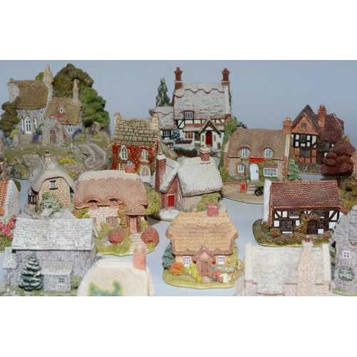 A collection of Lilliput lane cottages to include Honeysuckle cottage ...