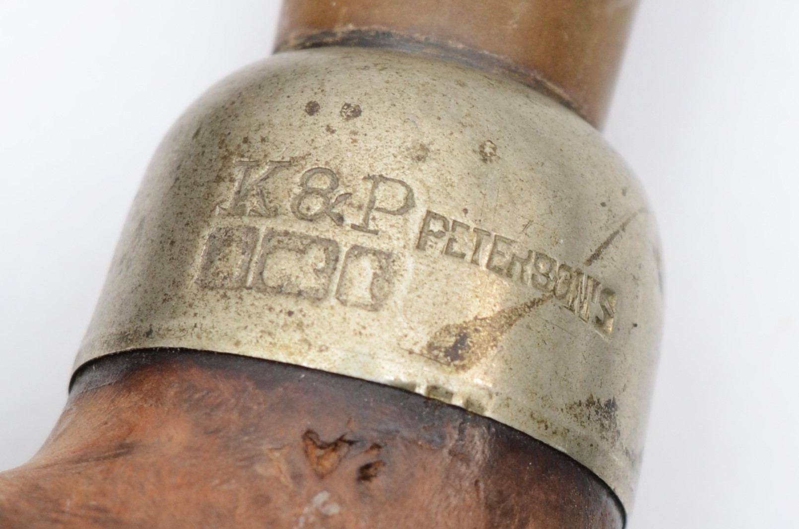 Seven Peterson Irish tobacco pipes to include two silver collared ...