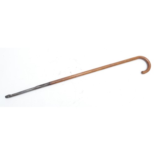 A vintage cheese corer with walking stick handle, 87cm