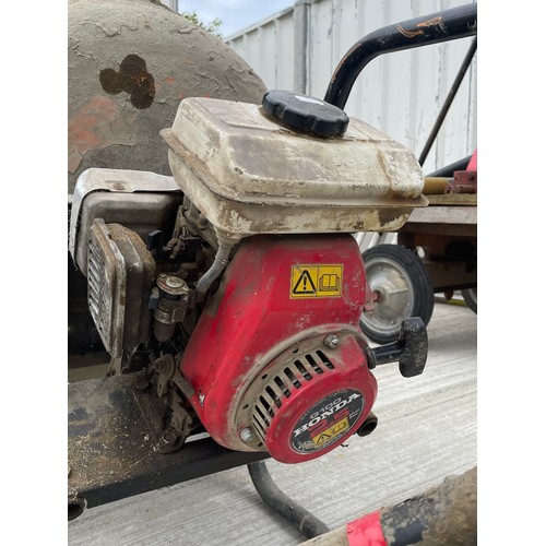 A cement mixer with Honda G100 2.5 petrol engine on stand.