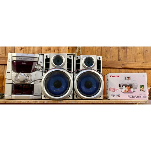 A Panasonic midi Hi-Fi system, model SA-AK210, with a pair of matching ...