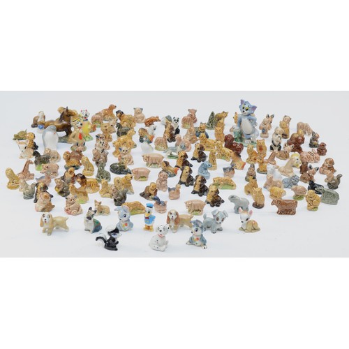 A large collection of Wade 'whimsies' porcelain figures and animal ...