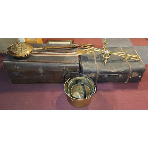 A set of three early 20th century graduated brass jam pans, together ...