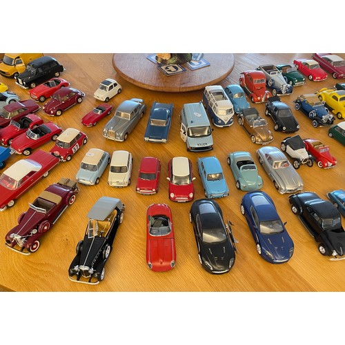 A large quantity of assembled plastic scale model cars to include ...