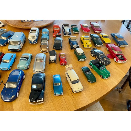 A large quantity of assembled plastic scale model cars to include ...