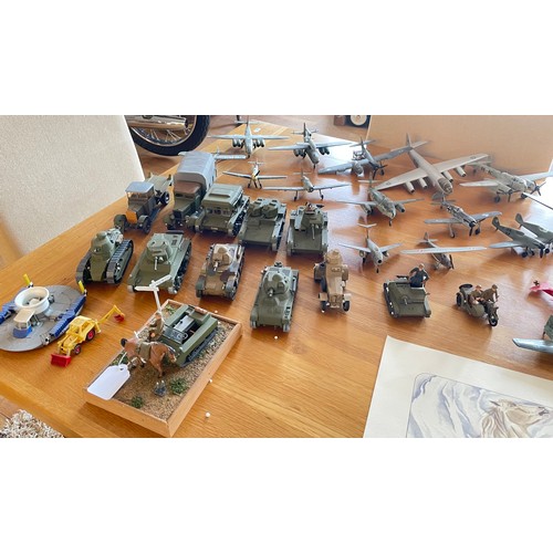 A large quantity of assembled plastic scale model military inspired ...