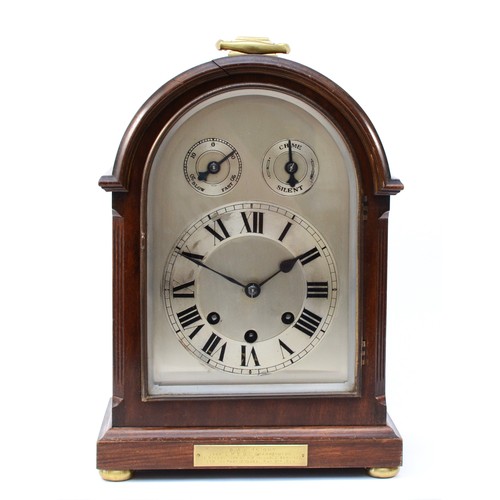 An early 20th century mahogany bracket clock, having arched ...
