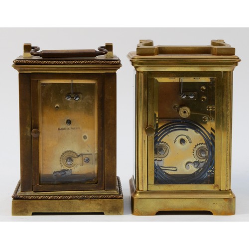 A 20th century brass case carriage clock, having 8 day movement striking on gong in traveling case,