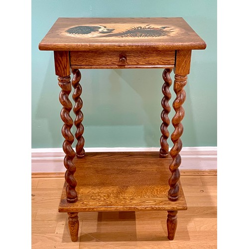 A 20th century oak side table with pokerwork decorated top, signed G ...