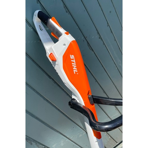 A Stihl cordless strimmer, model FSA45, lacking charger lead