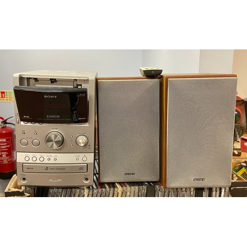 A Sony midi Hi-Fi system, CMT-SP290DB together with a large collection ...