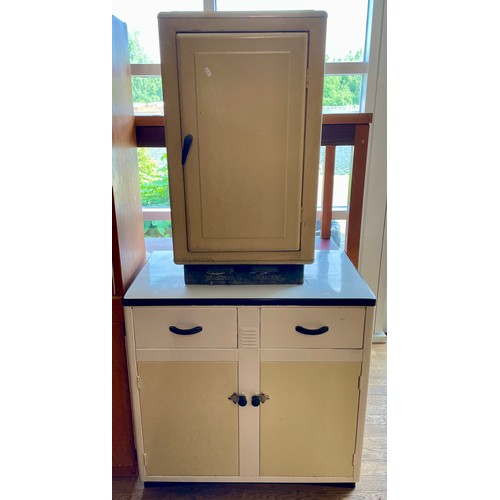 A 1950s metal kitchen cupboard/cabinet, having two frieze drawers over ...