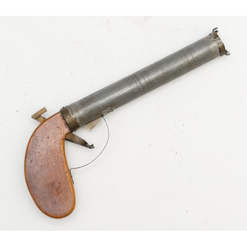 A mid 20th century novelty clowns 'Bang' gun, reveals a cloth banner ...