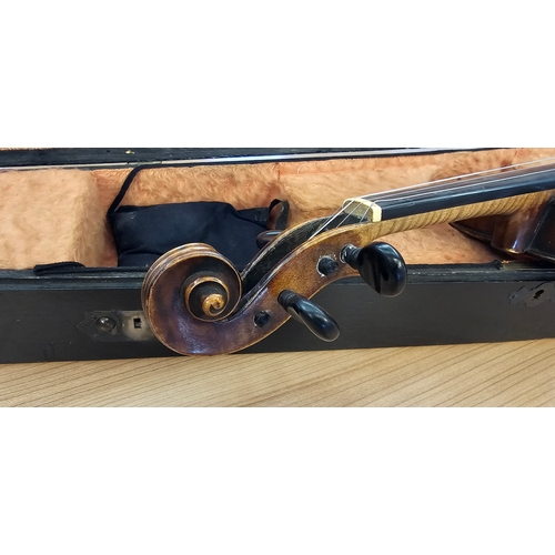 An early 20th century one piece German violin, label Copy of Nikolaus ...