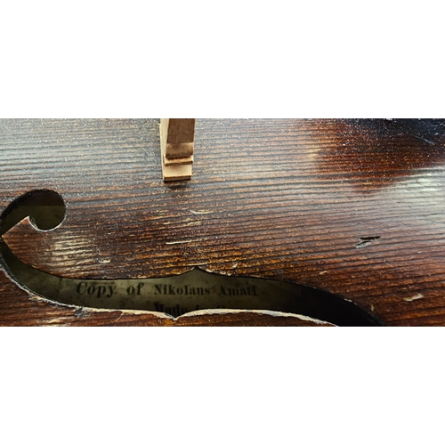 An early 20th century one piece German violin, label Copy of Nikolaus ...