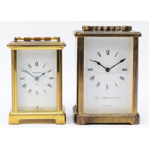A 20th century West German brass carriage clock, having enamelled dial ...