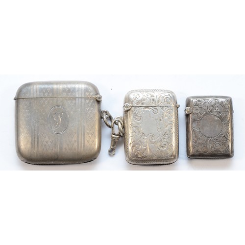 Three silver vesta cases, Birmingham 1897, 1905 and 1926, 74gm