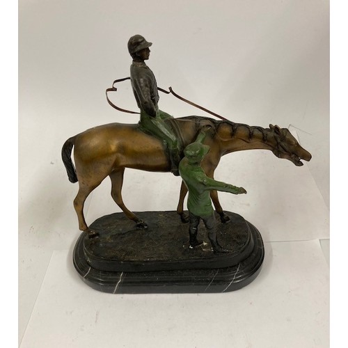 A 20th century Austrian cold painted spelter group, of a racing horse ...
