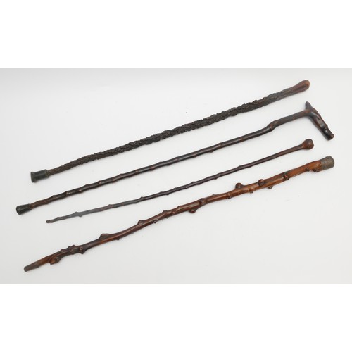 A Victorian silver mounted knobbly hardwood walking stick, 89cm and ...