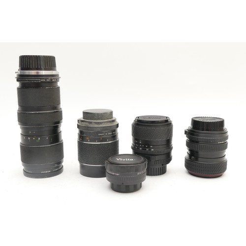 Four various camera lenses