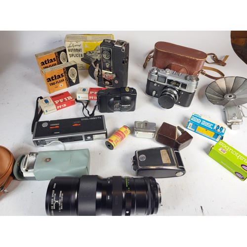 A Collection of Cameras, to include a boxed Minolta 16, Sigma zoom lens ...