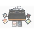An Atari games console, model CX-2600 U, with power lead and six games.